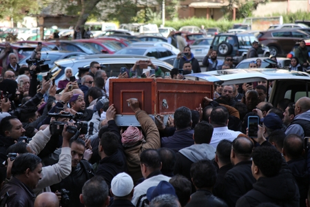 The funeral procession of the Egyptian folk music legend Ahmed Adaweya ...