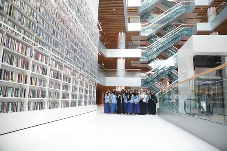 Young girls in a school trip to Mohammed bin Rashid library, Dubai, UAE ...