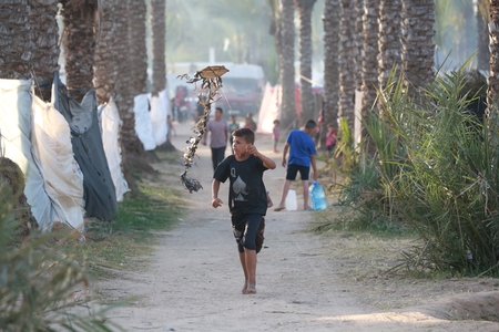 Young Palestinian boy playing with his kite Gaza-Strip-Palestine. • The ...
