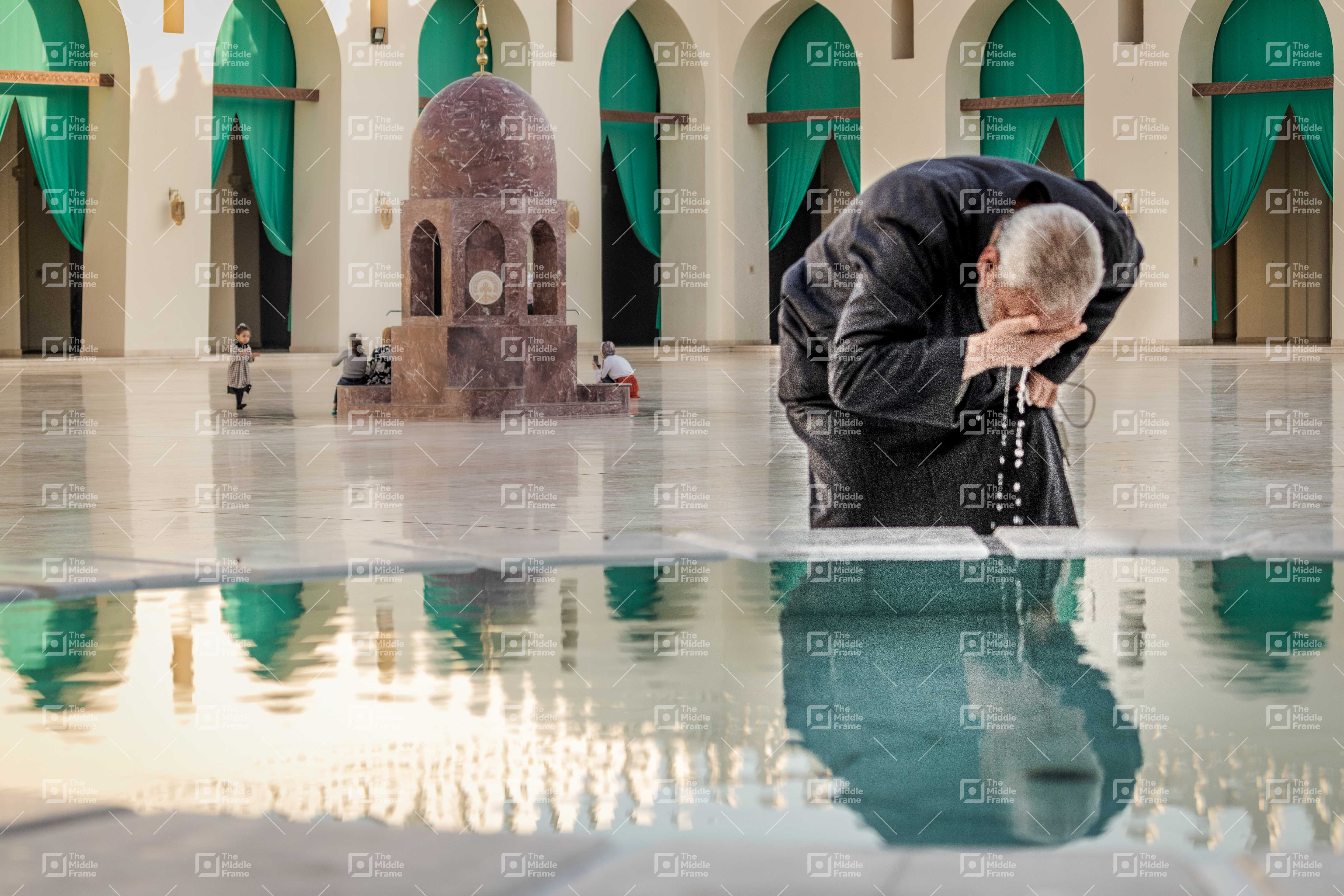 Old man washing • The Middle Frame • Arab Stock Photos and Images